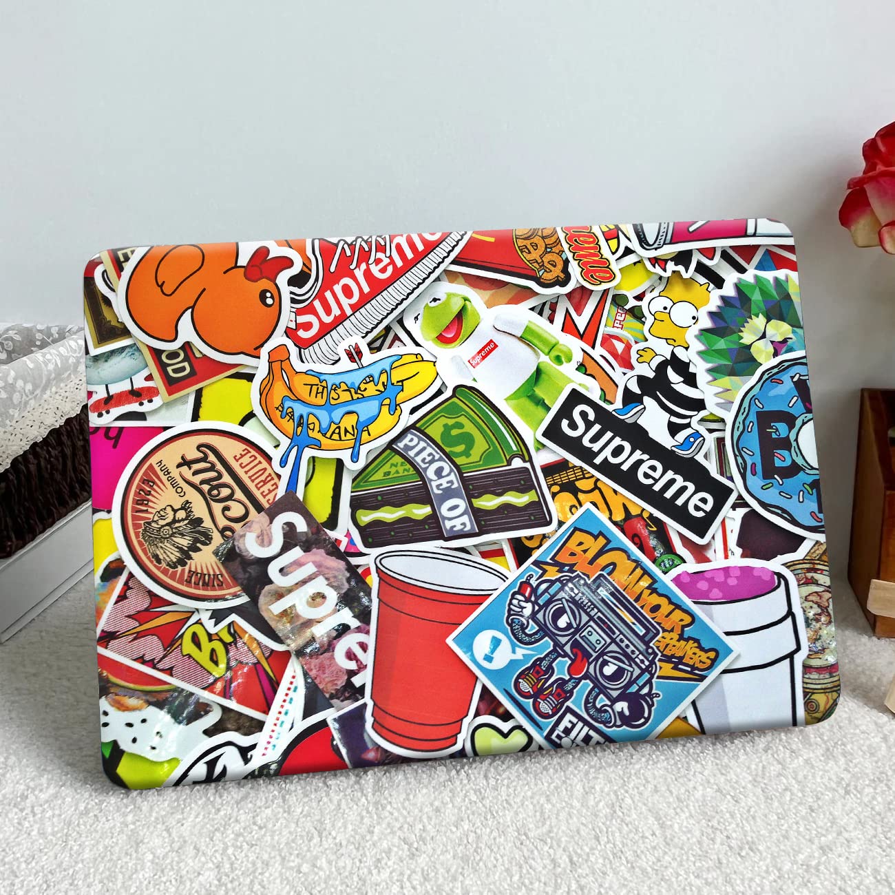 Macbook With Supreme Stickers