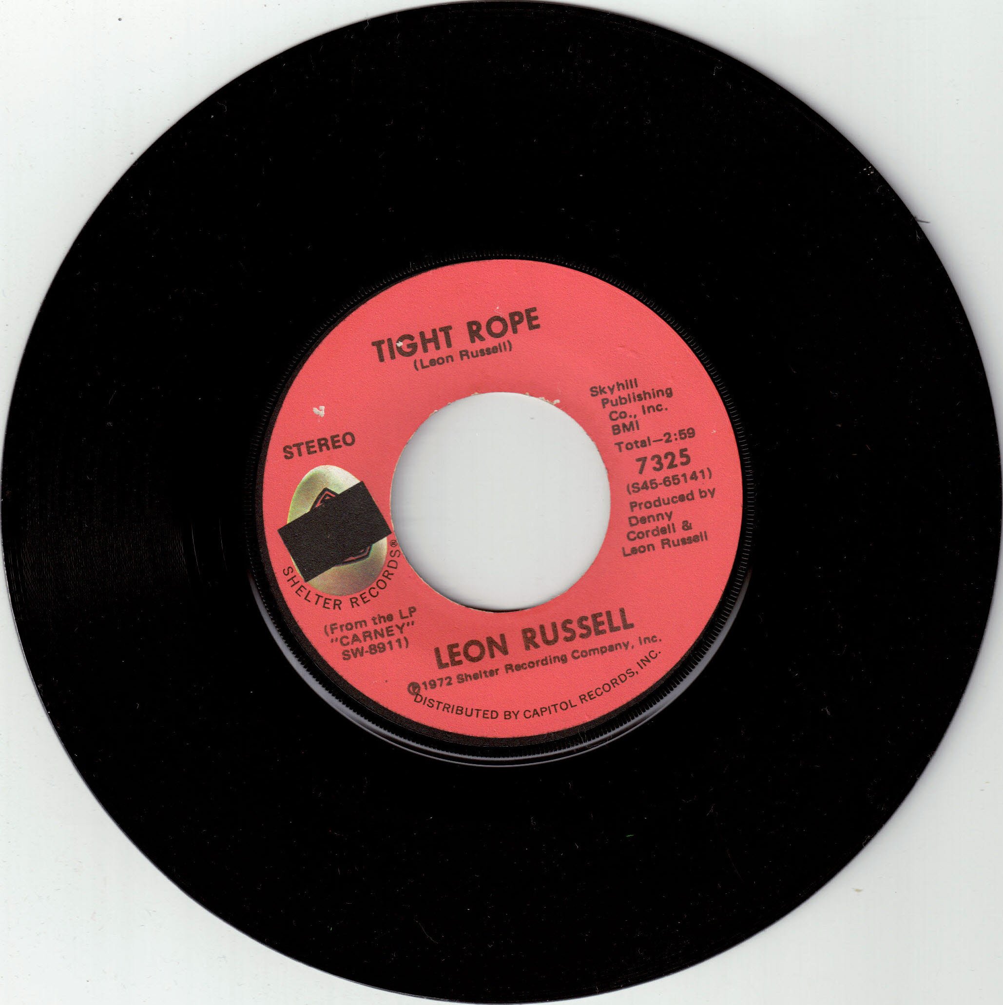 RUSSELL, Leon / This Masquerade bw Tight Rope / 45rpm record: Amazon.ca ...