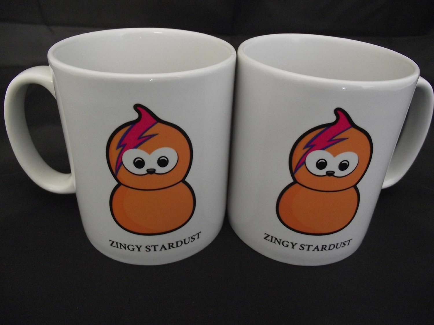 Zingy Stardust Mug - EDF Mascot : Amazon.co.uk: Home & Kitchen