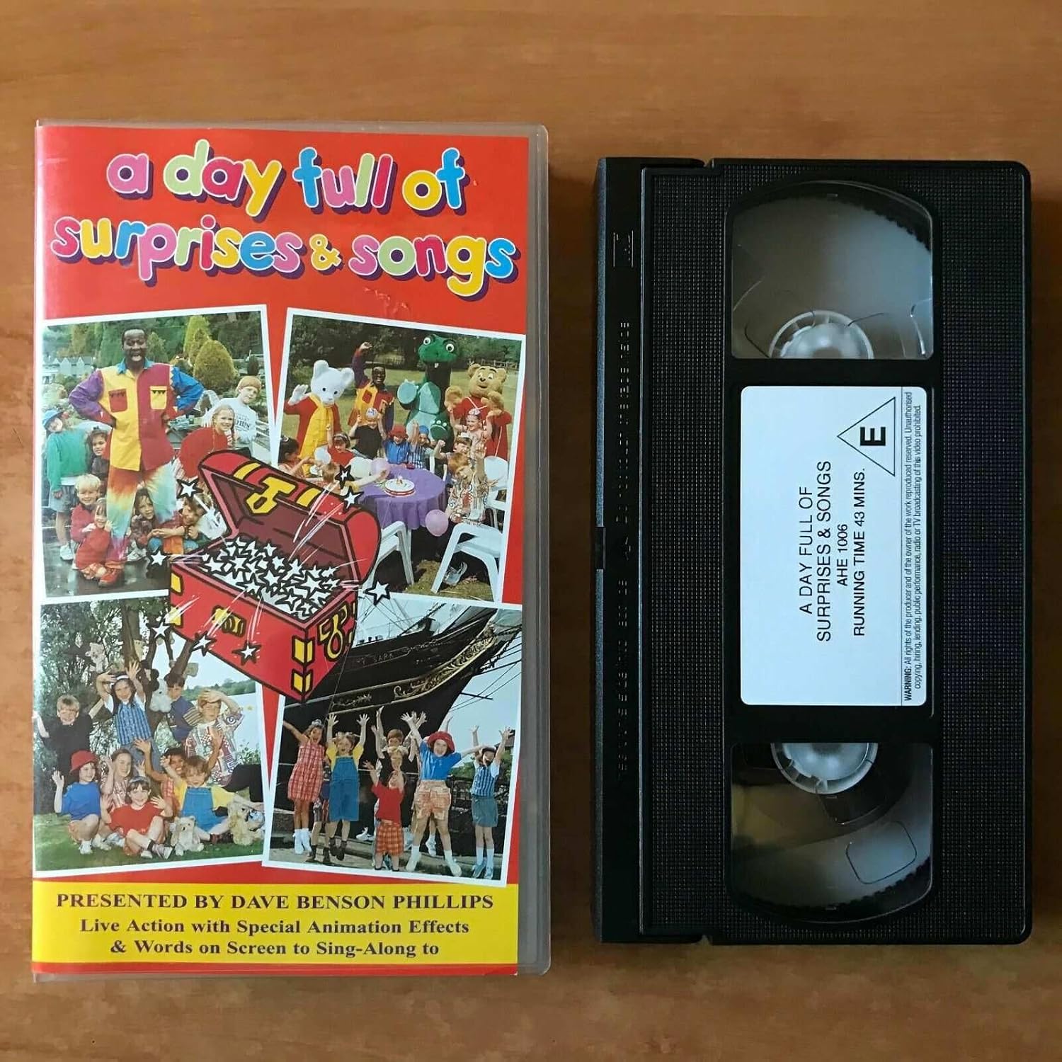 Amazon.com: A Day Full Of Surprises And Songs [VHS] : Electronics