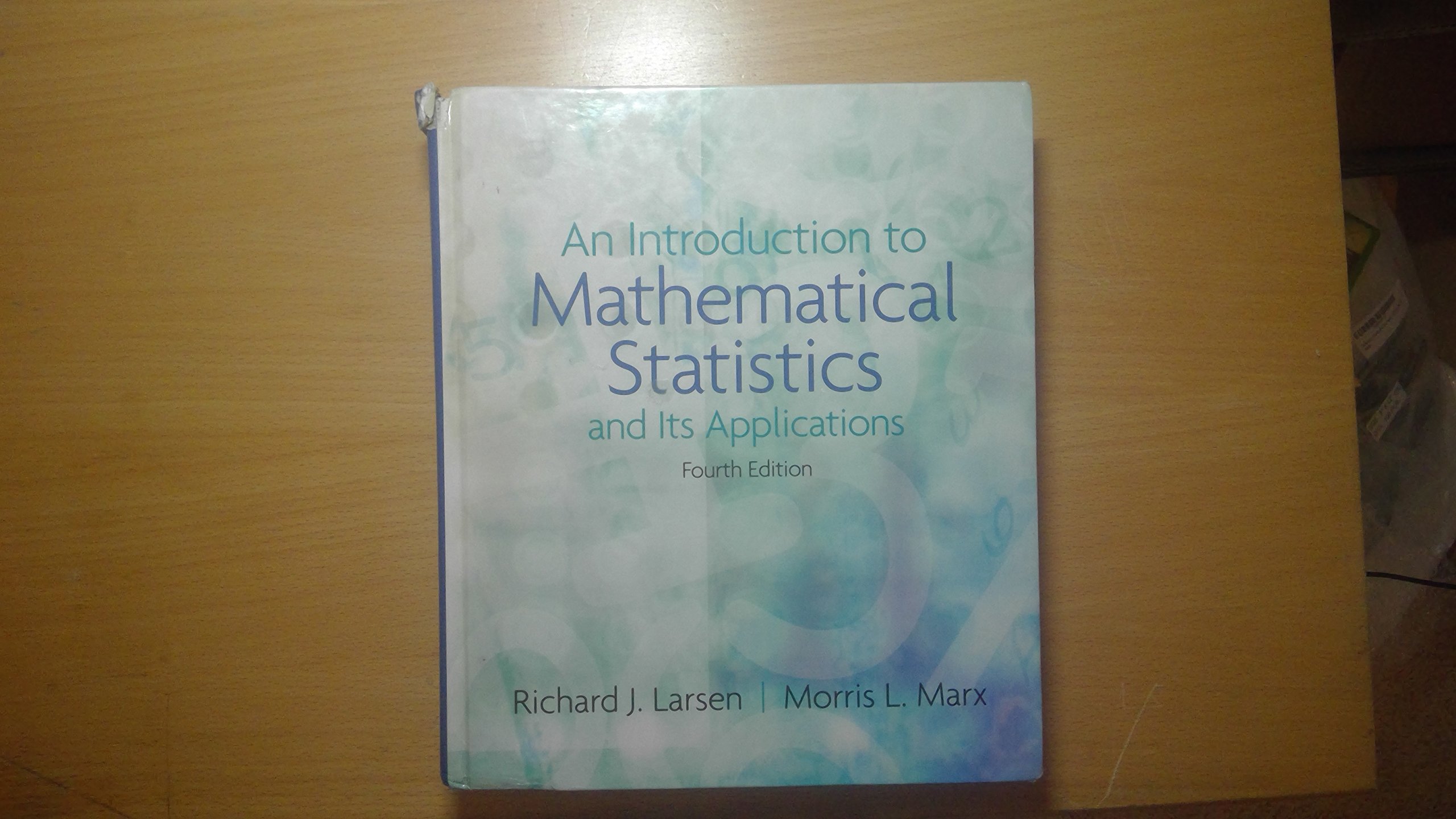 Amazon.com: An Introduction to Mathematical Statistics and Its ...