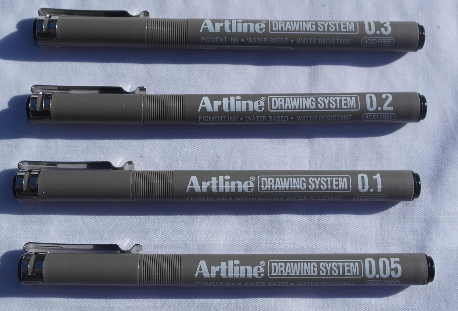 Set of four Artline drawing system pens 0.05mm, 0.1mm, 0.2mm and 03mm ...