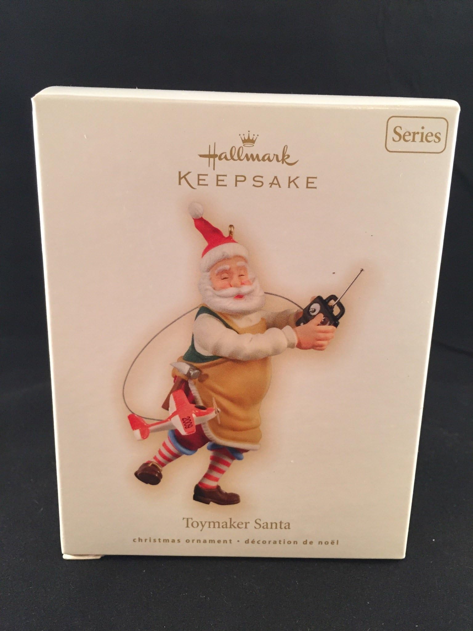 Amazon.com: Toymaker Santa #12 2011 Hallmark Ornament - QX8757 : Home ...