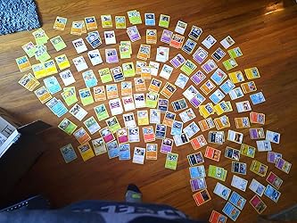 Amazon.com: 100 Assorted Pokemon Trading Cards. : Toys & Games