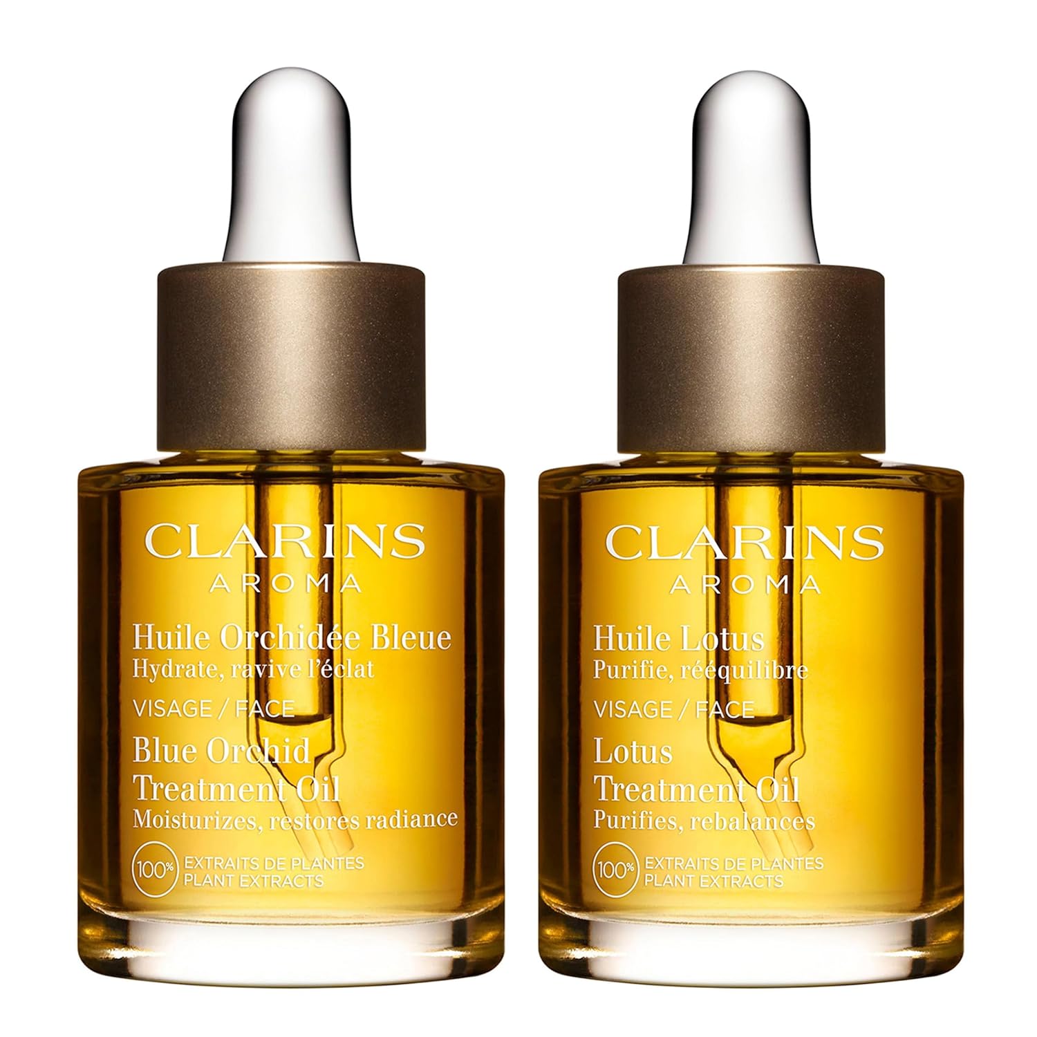 Amazon.com: Clarins Blue Orchid Face Treatment Oil and Lotus Face ...