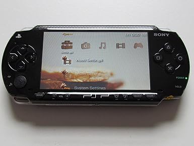 Sony PSP Handheld Console Value Pack, Includes Memory Stick, Battery ...