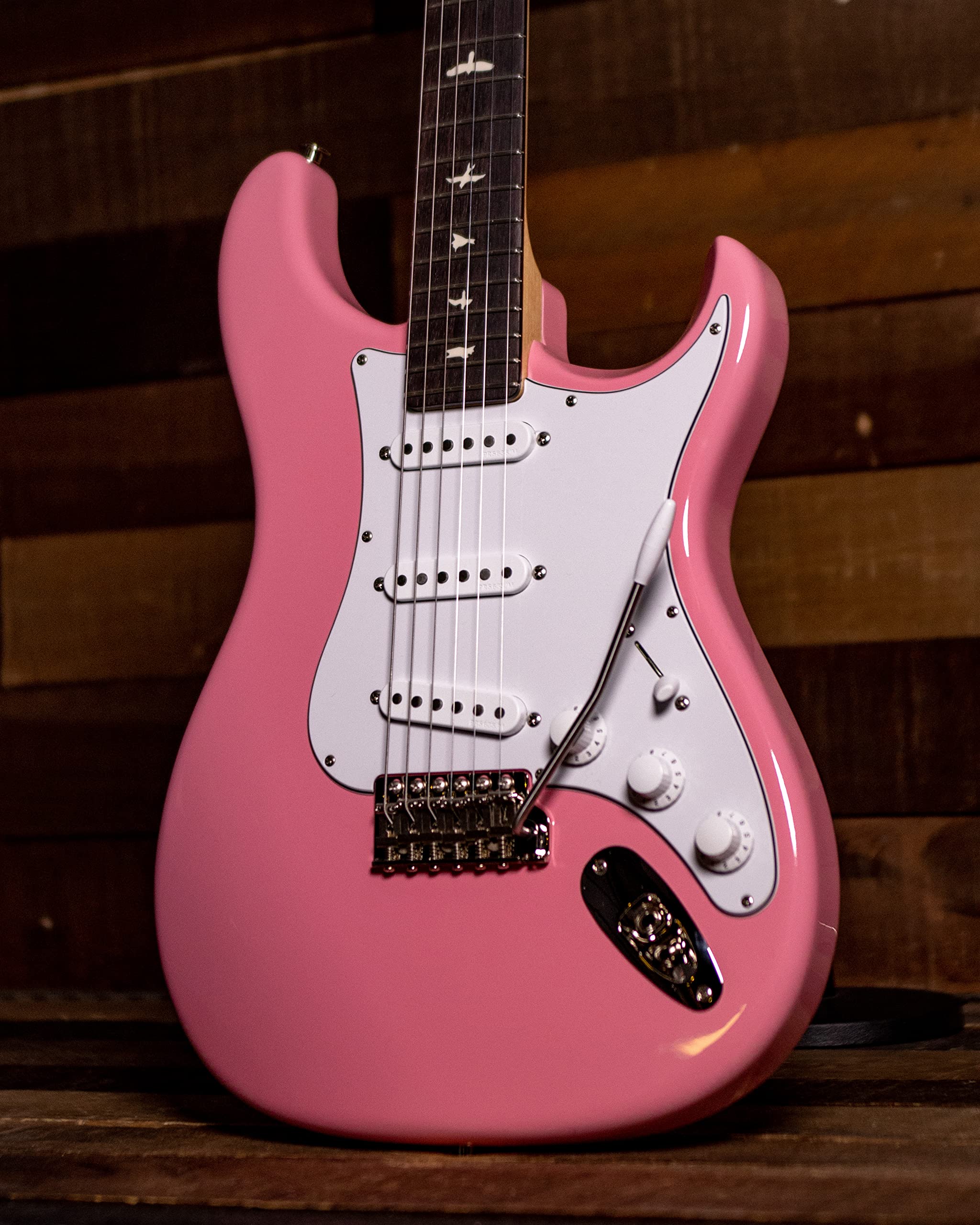 Pink And Black Electric Guitar