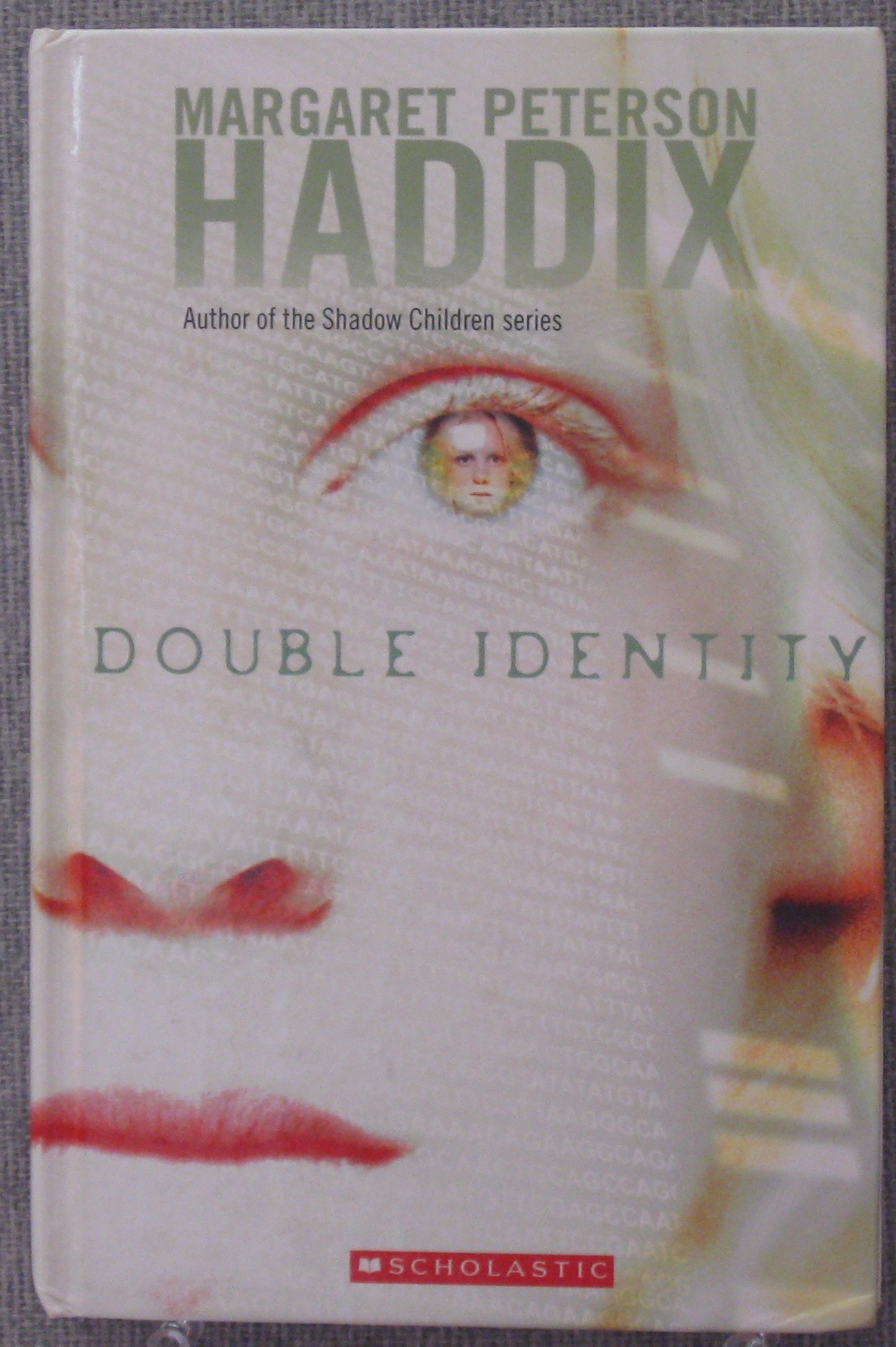 DOUBLE IDENTITY: HADDIX MARGARET PETERSON: 9780439827874: Amazon.com: Books