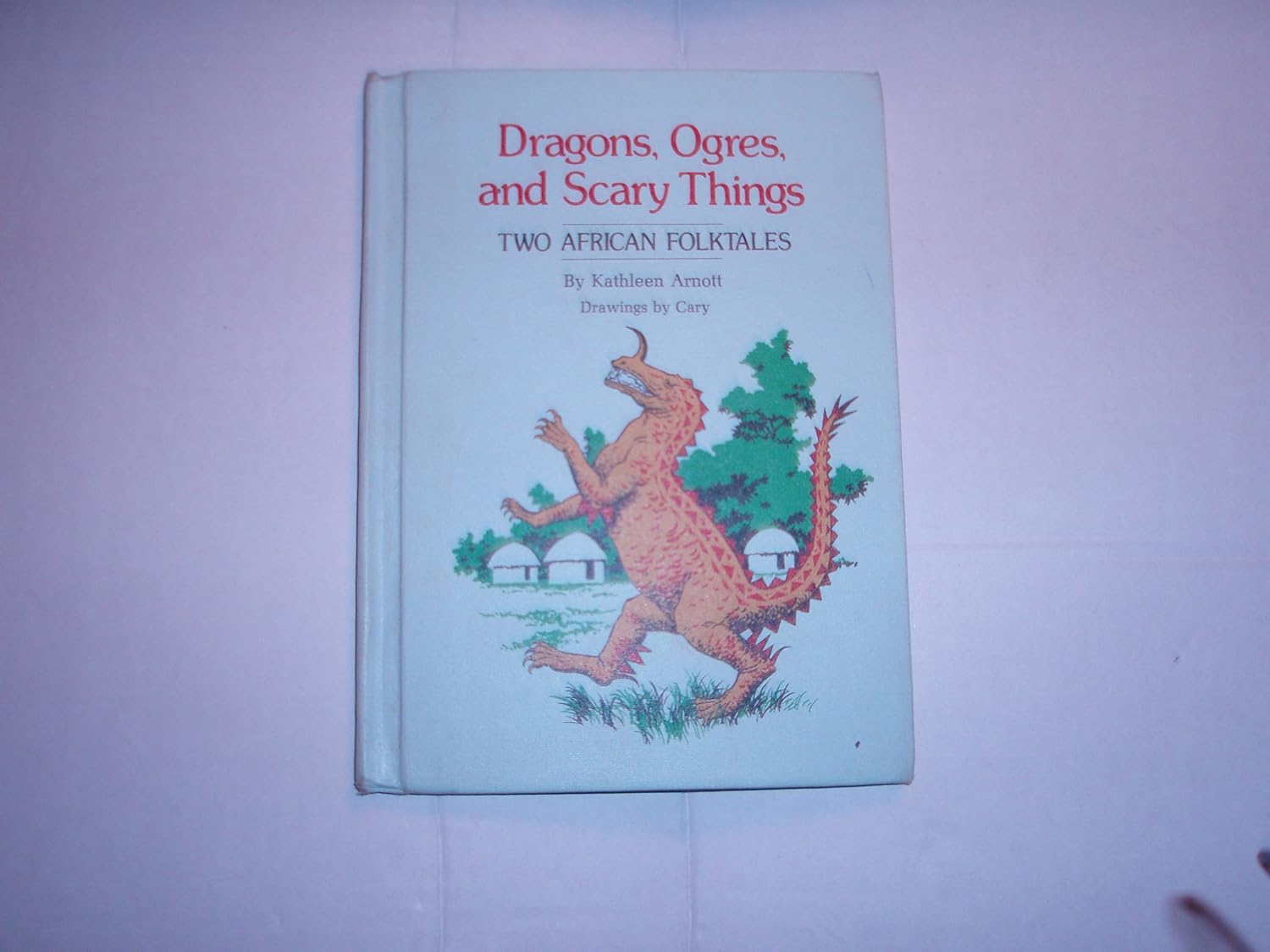 Dragons, ogres, and scary things;: Two African folktales: Arnott ...