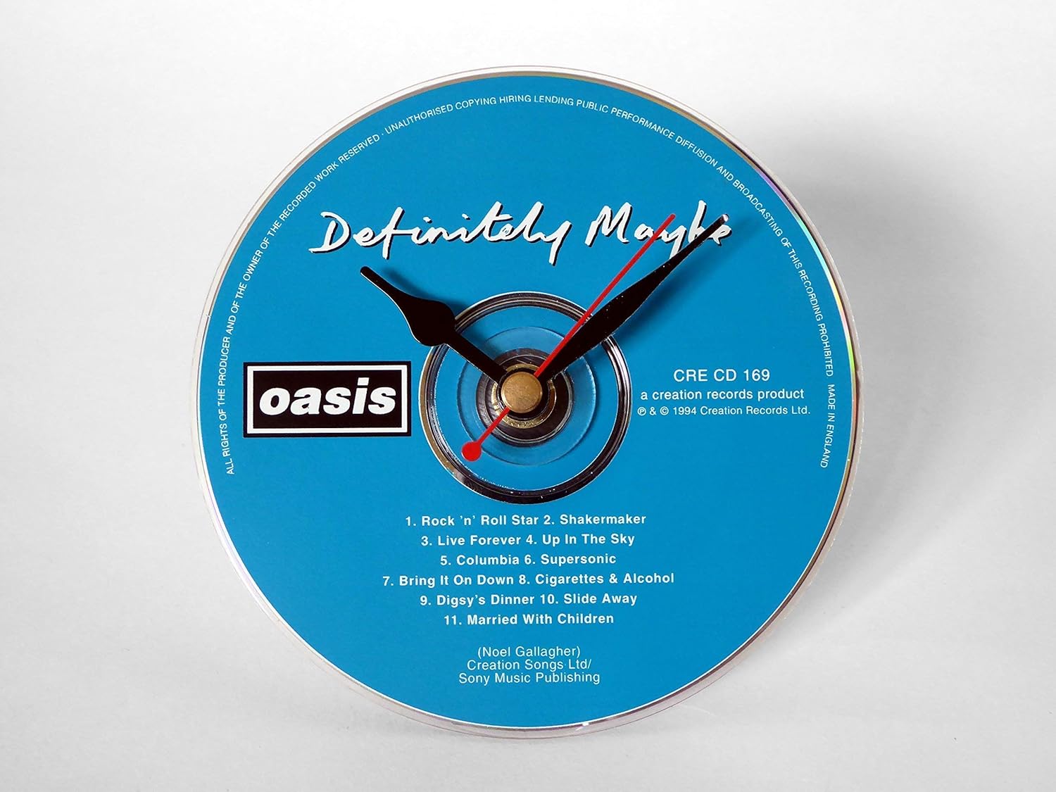 Oasis ''Definitely Maybe'' CD Clock and Keyring Gift Set : Amazon.co.uk ...