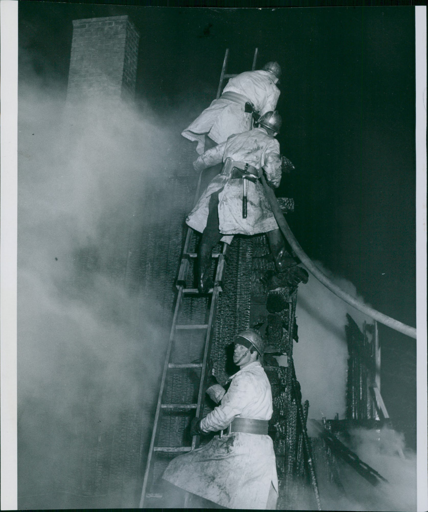 Buy Vintage photo of Firefighters in full speed after extinguishing the ...