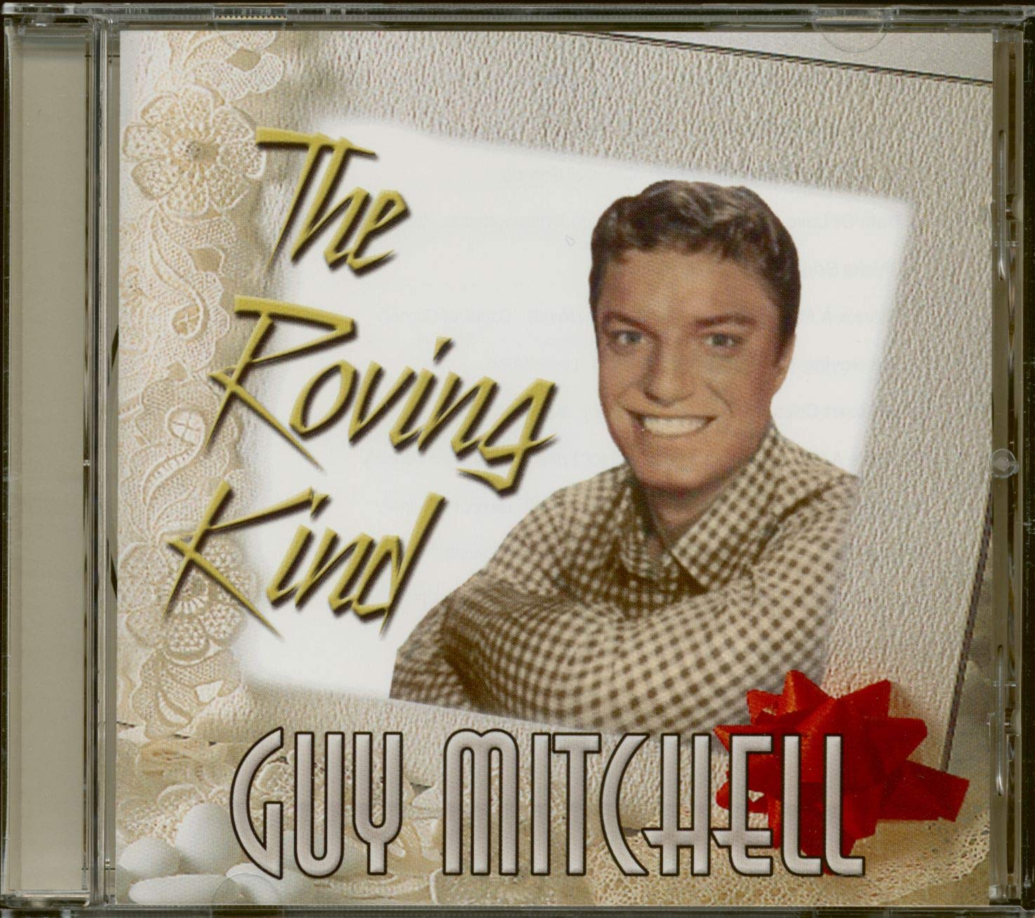 Roving Kind: Mitchell, Guy: 0827565003822: Amazon.com: Books