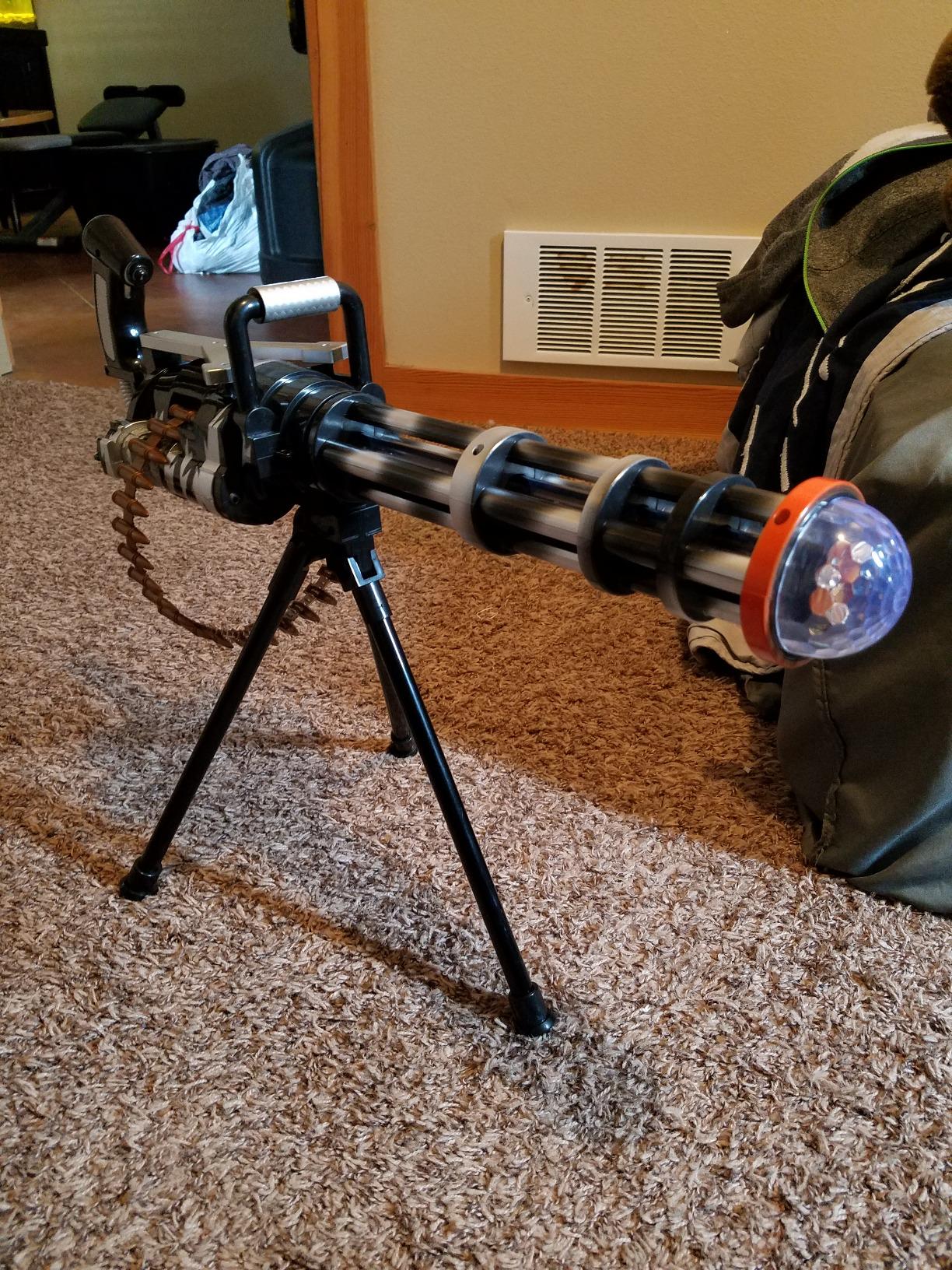 Amazon.com: Mozlly Light Up Rotating Gun Toy with Tripod - Realistic ...