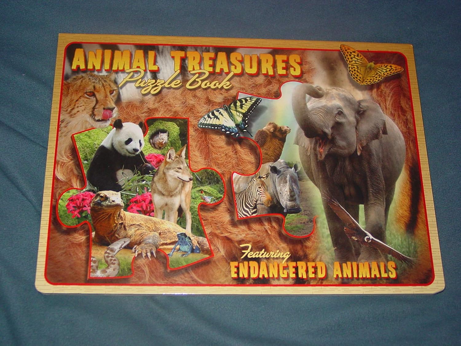 Amazon.co.jp: Animal Treasures Puzzle Book Featuring Endangered Animals ...