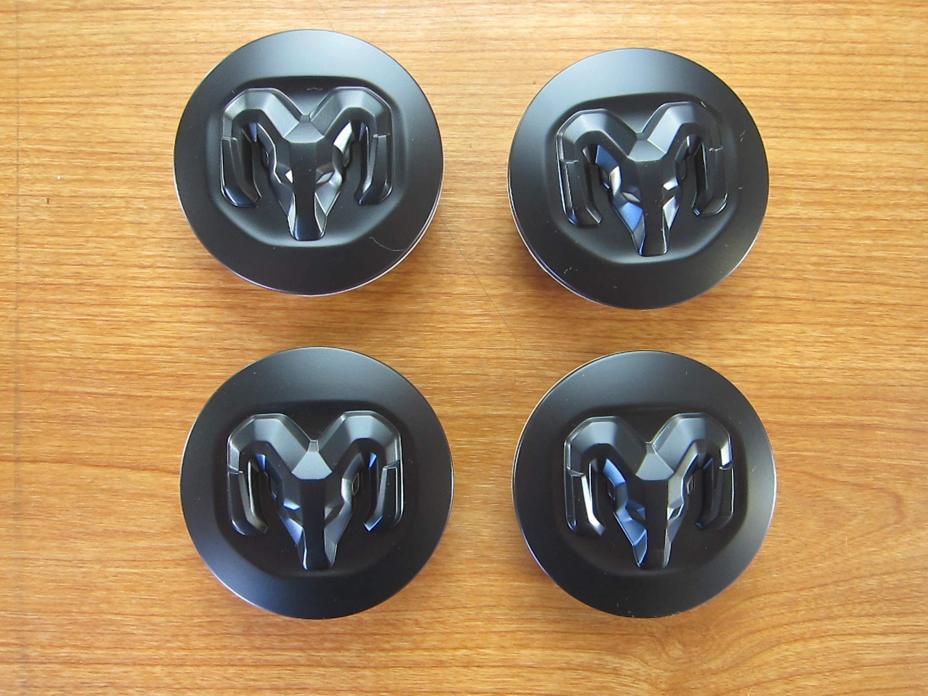Amazon.com: Mopar Ram 1500 DT Black Set of Four Black Wheel Center Caps ...
