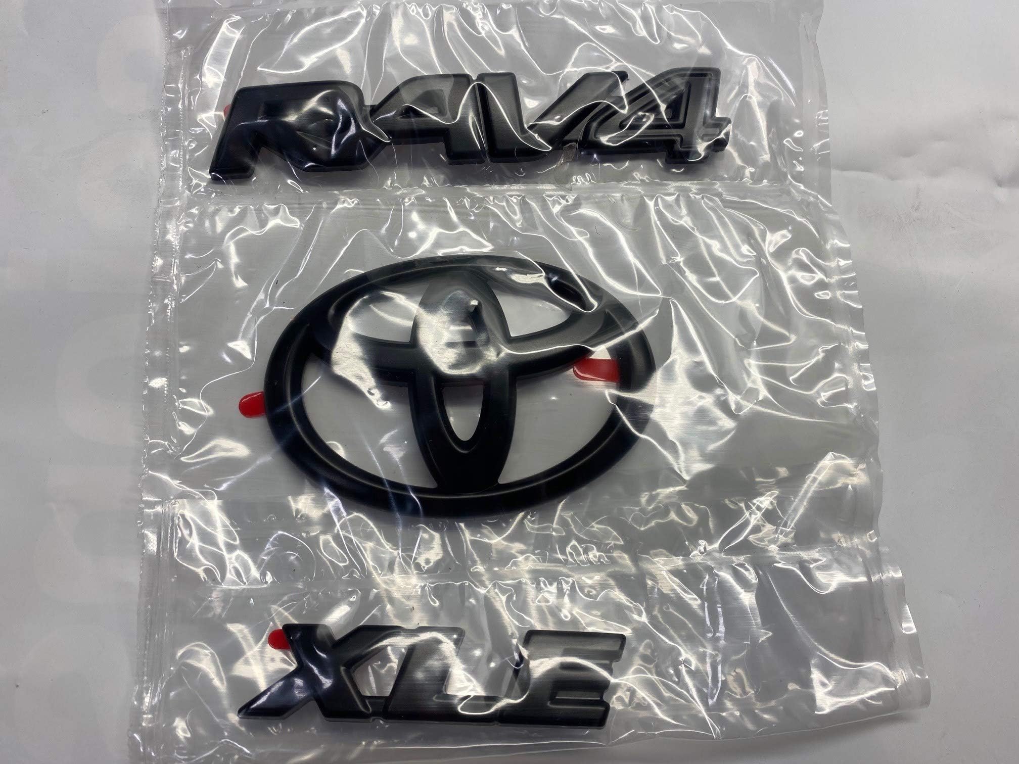 Amazon.com: Genuine Toyota RAV4 XLE Blackout Black Emblem Overlays ...
