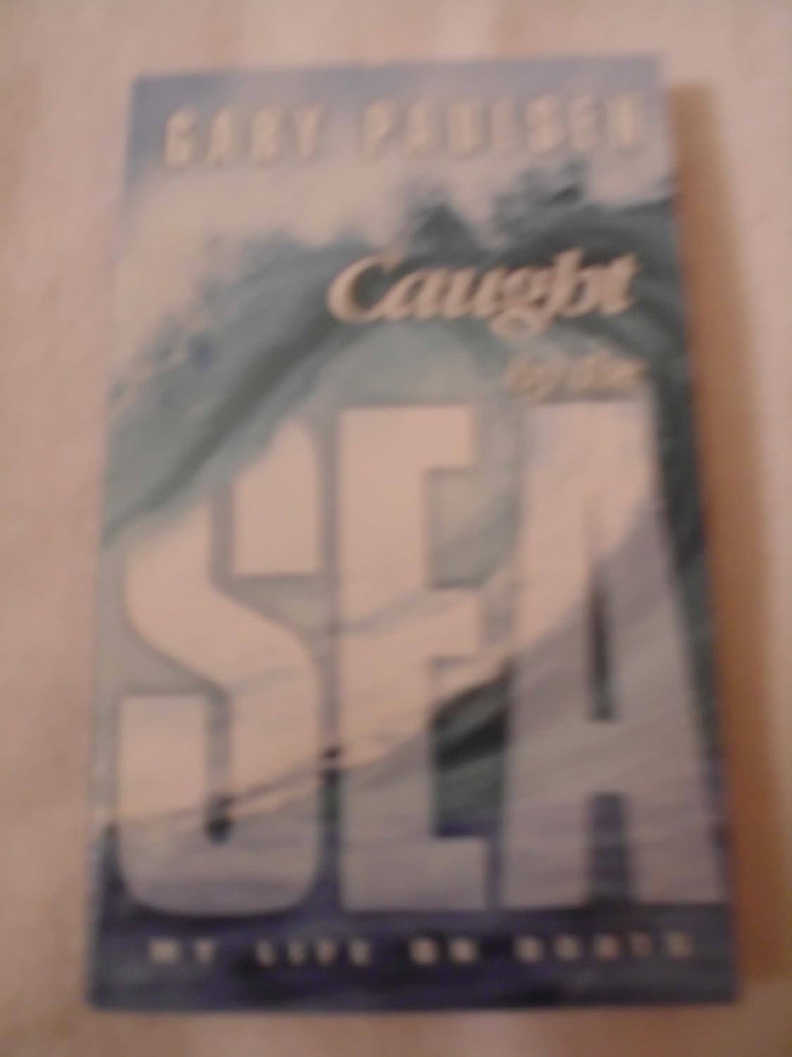 Caught by the Sea: My Life on Boats: unknown author: Amazon.com: Books