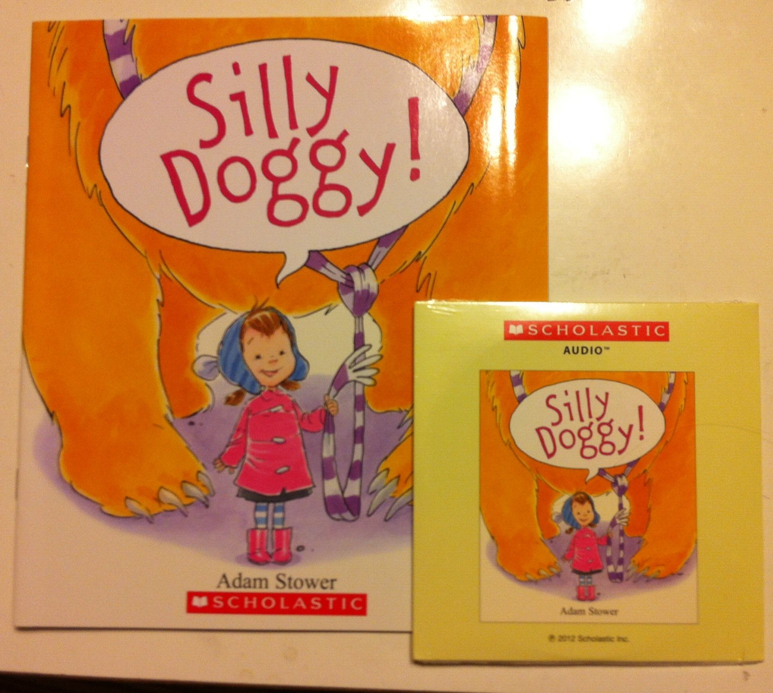 Amazon.com: Silly Doggy Book and Audio CD: 9780545531504: Adam Stower