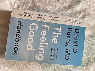 The Feeling Good Handbook: Burns, David D.: 9780452281325: Amazon.com ...