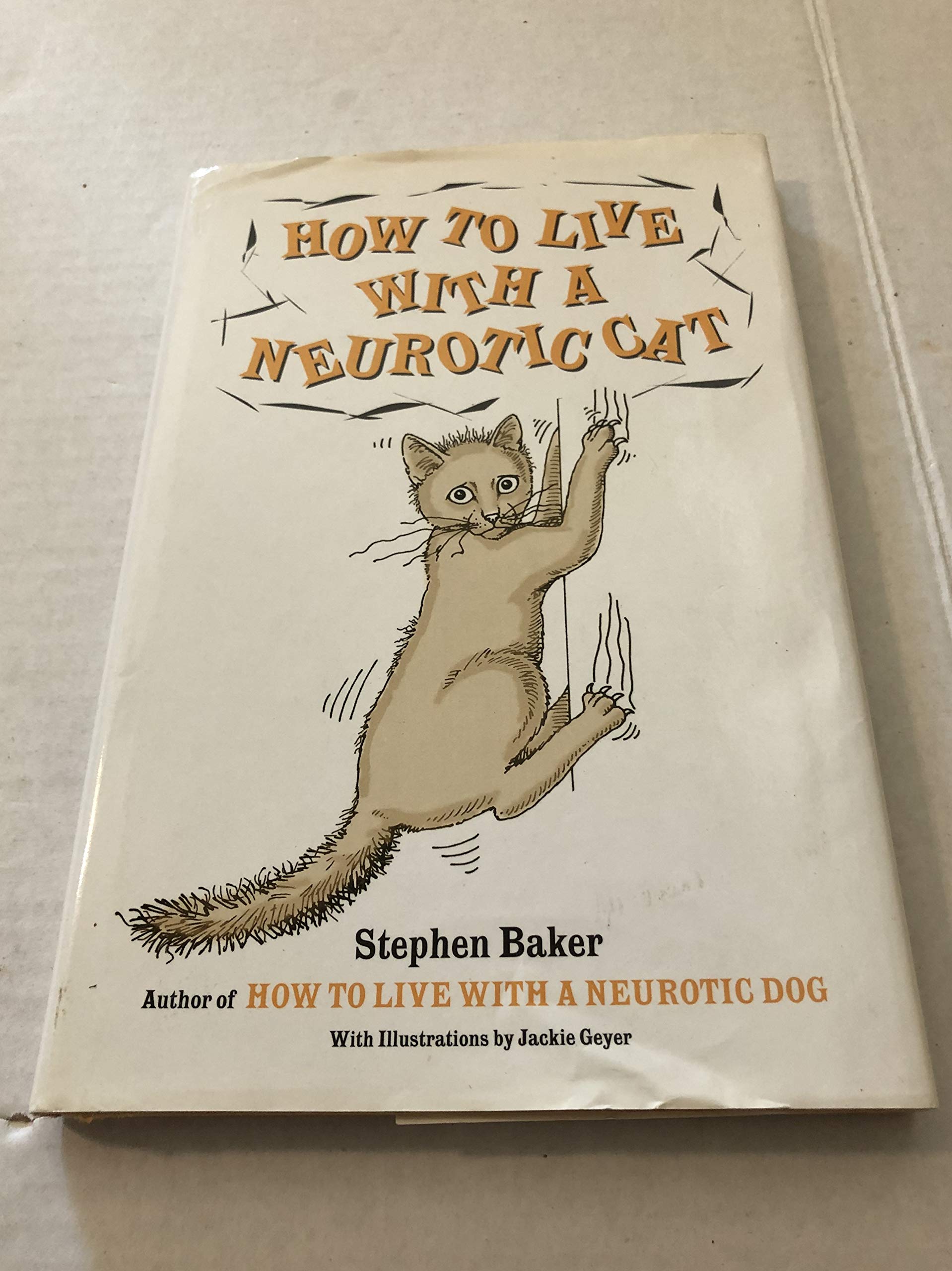 How to Live with a Neurotic Cat: Baker, Stephen: 9780517207345: Amazon ...