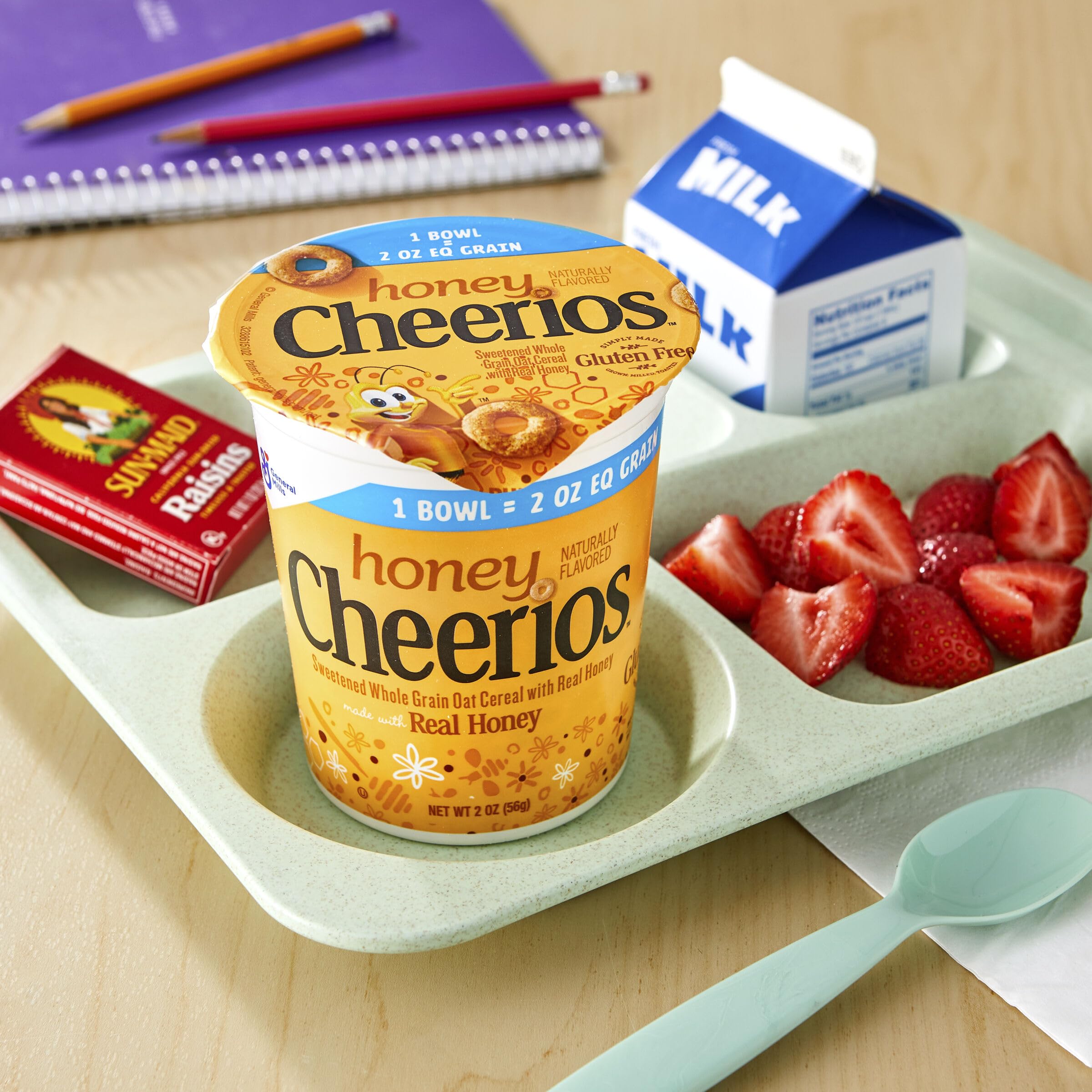 Bowl Of Cheerios With Milk And Spoon