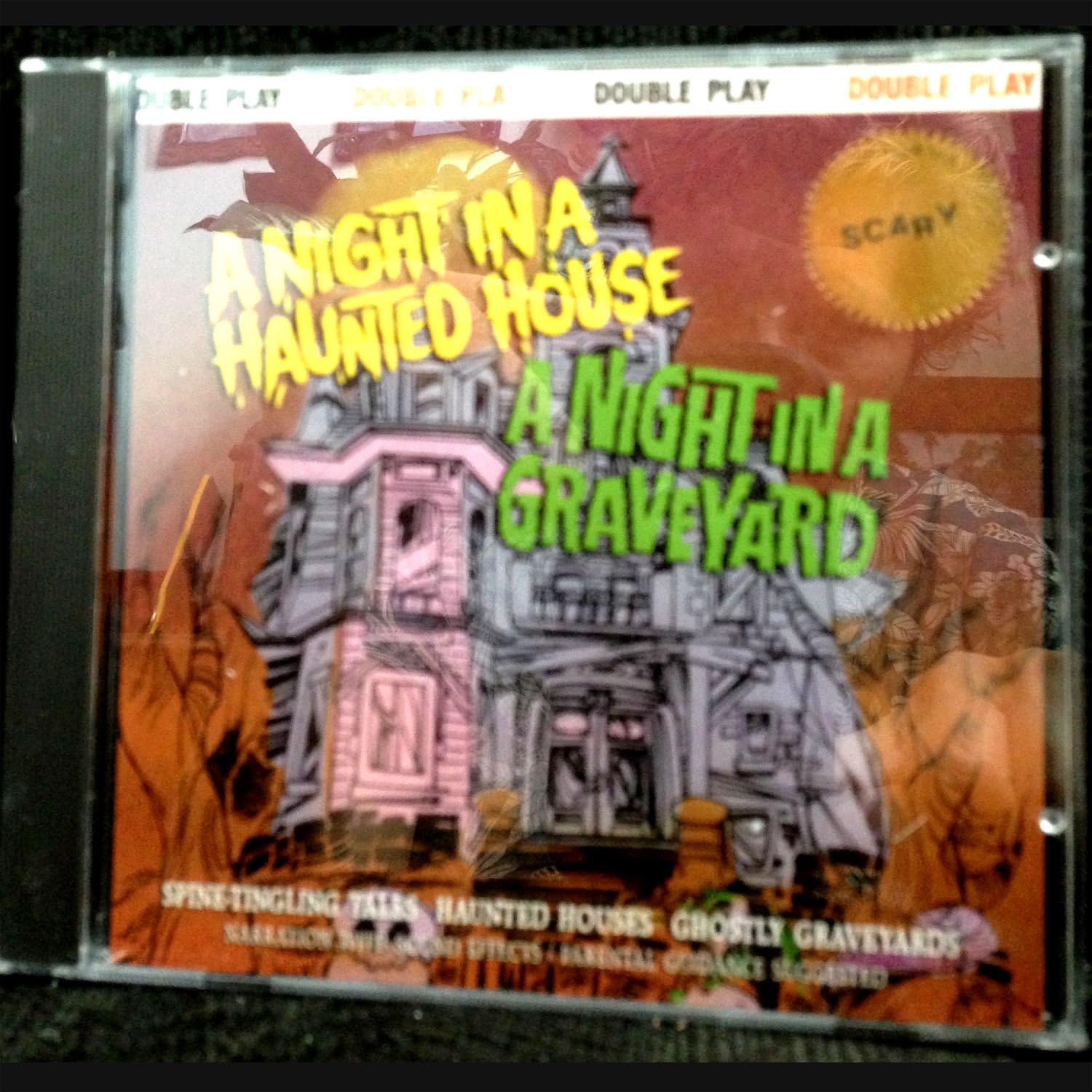 A Night in a Haunted House/a Night in a Graveyard: Amazon.ca: Music