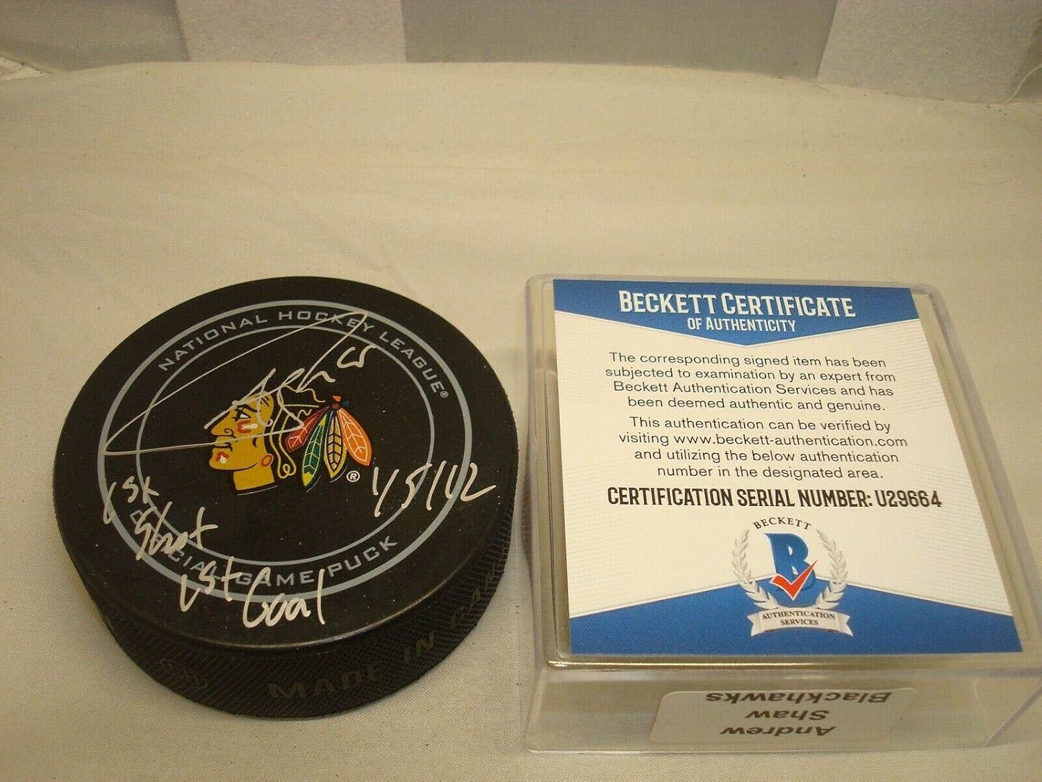 Amazon.com: Andrew Shaw Signed Blackhawks Official Game Hockey Puck ...