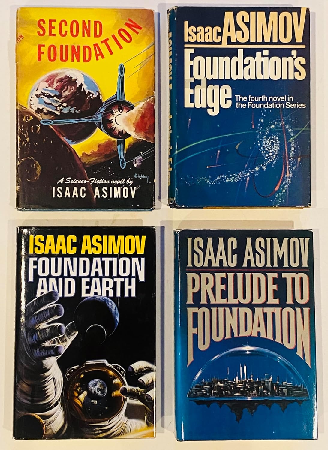 4 Isaac Asimov Books! 1) Second Foundation 2) Foundation's Edge 3) Foundation and Earth 4 ...