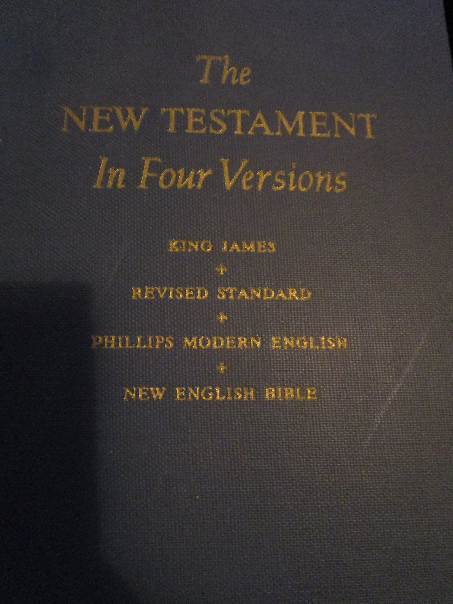 The New Testament in Four Versions: King James, Revised Standard ...