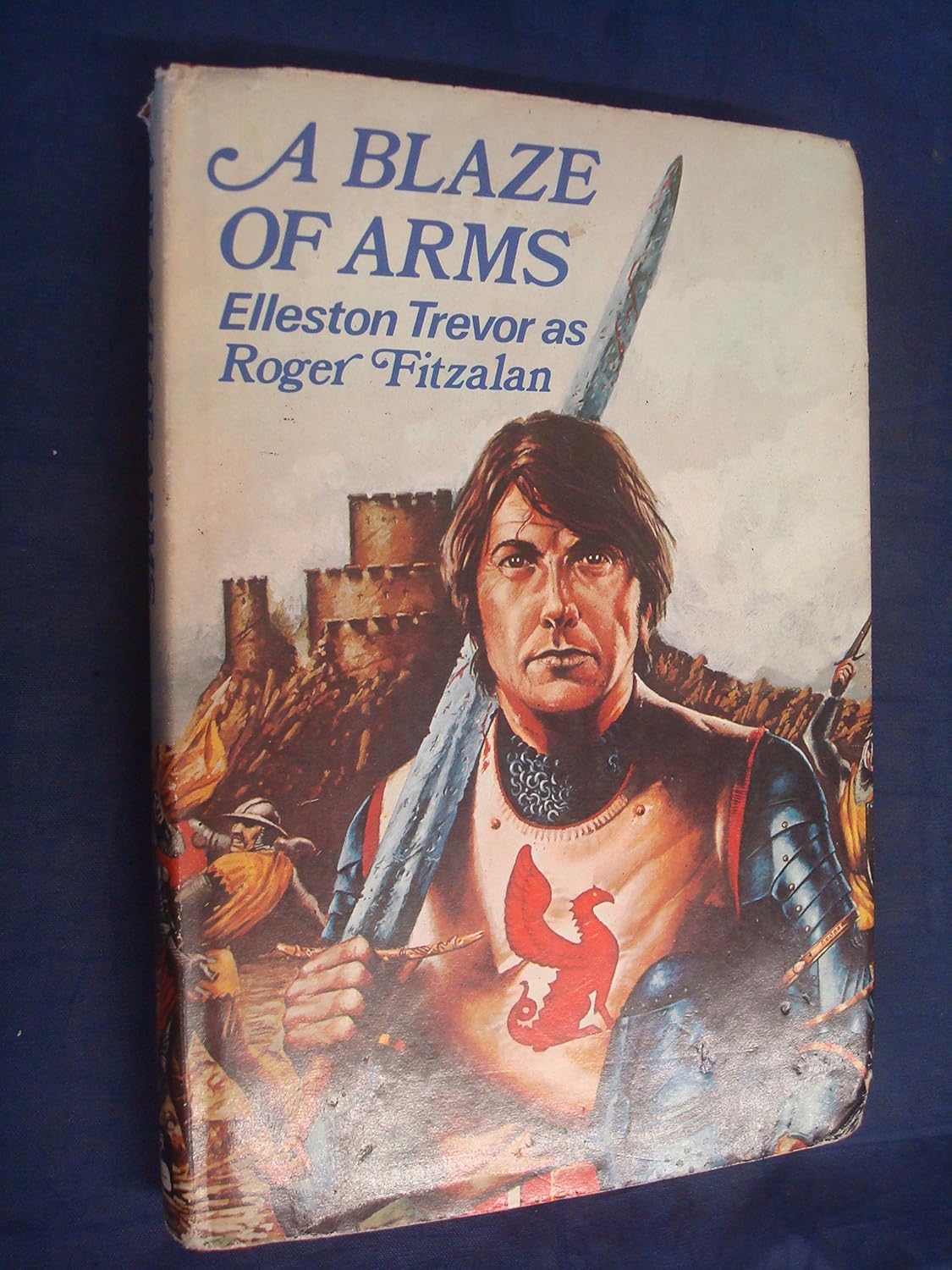 A blaze of arms: Roger Fitzalan: 9780856173677: Amazon.com: Books