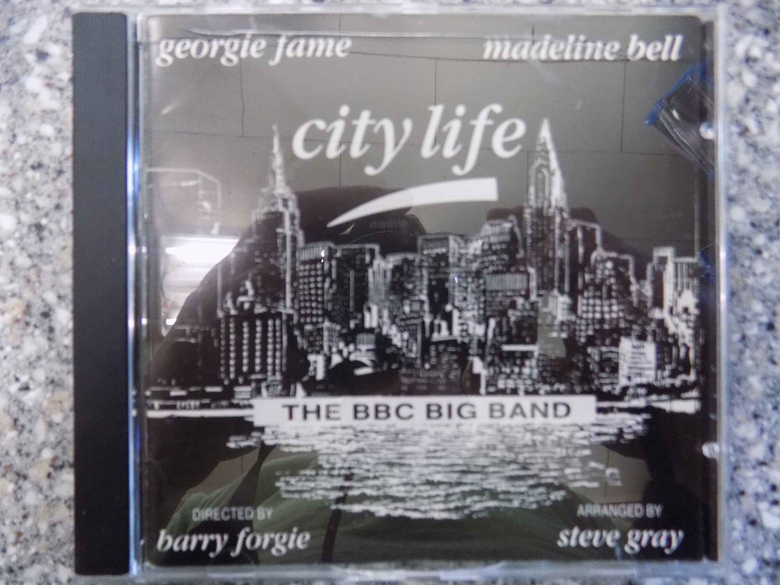 City Life by : Amazon.co.uk: CDs & Vinyl