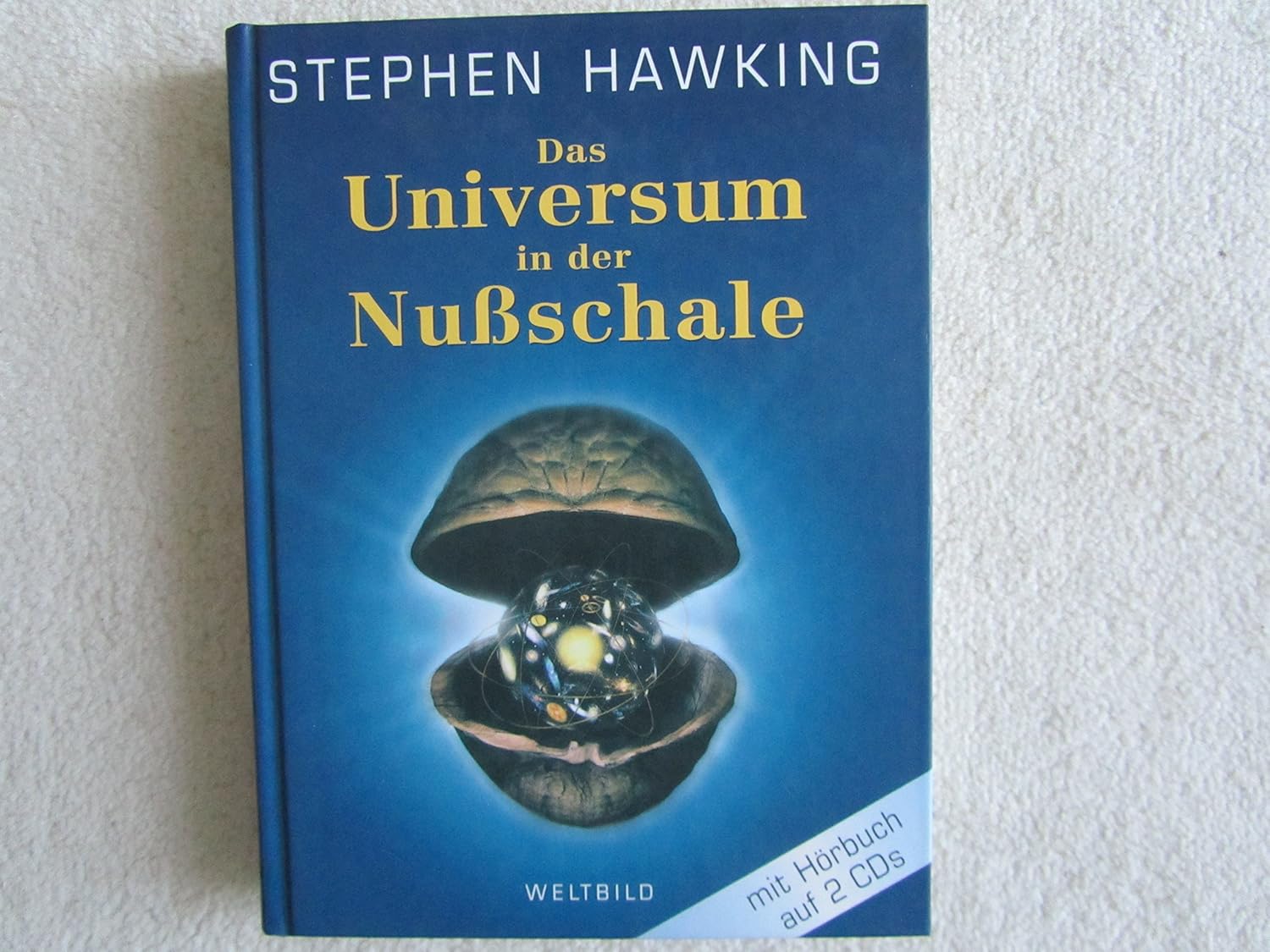 Das Universum in der Nußschale mit Hörbuch auf 2 CD s : Amazon.de: Bücher