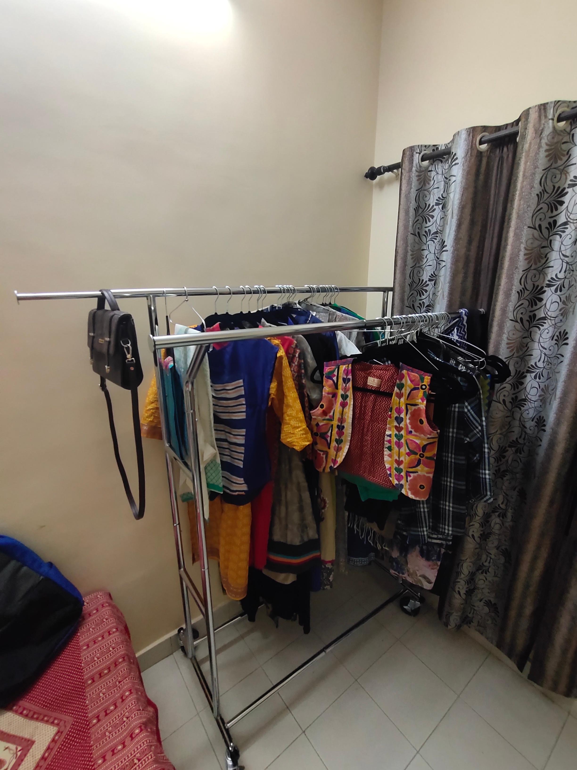 AmazonBasics Rolling Double Rail Clothing Garment Rack on Wheels ...