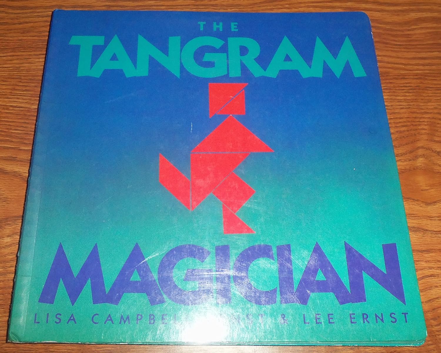 Amazon.fr - THE TANGRAM MAGICIAN - Collectif - Livres