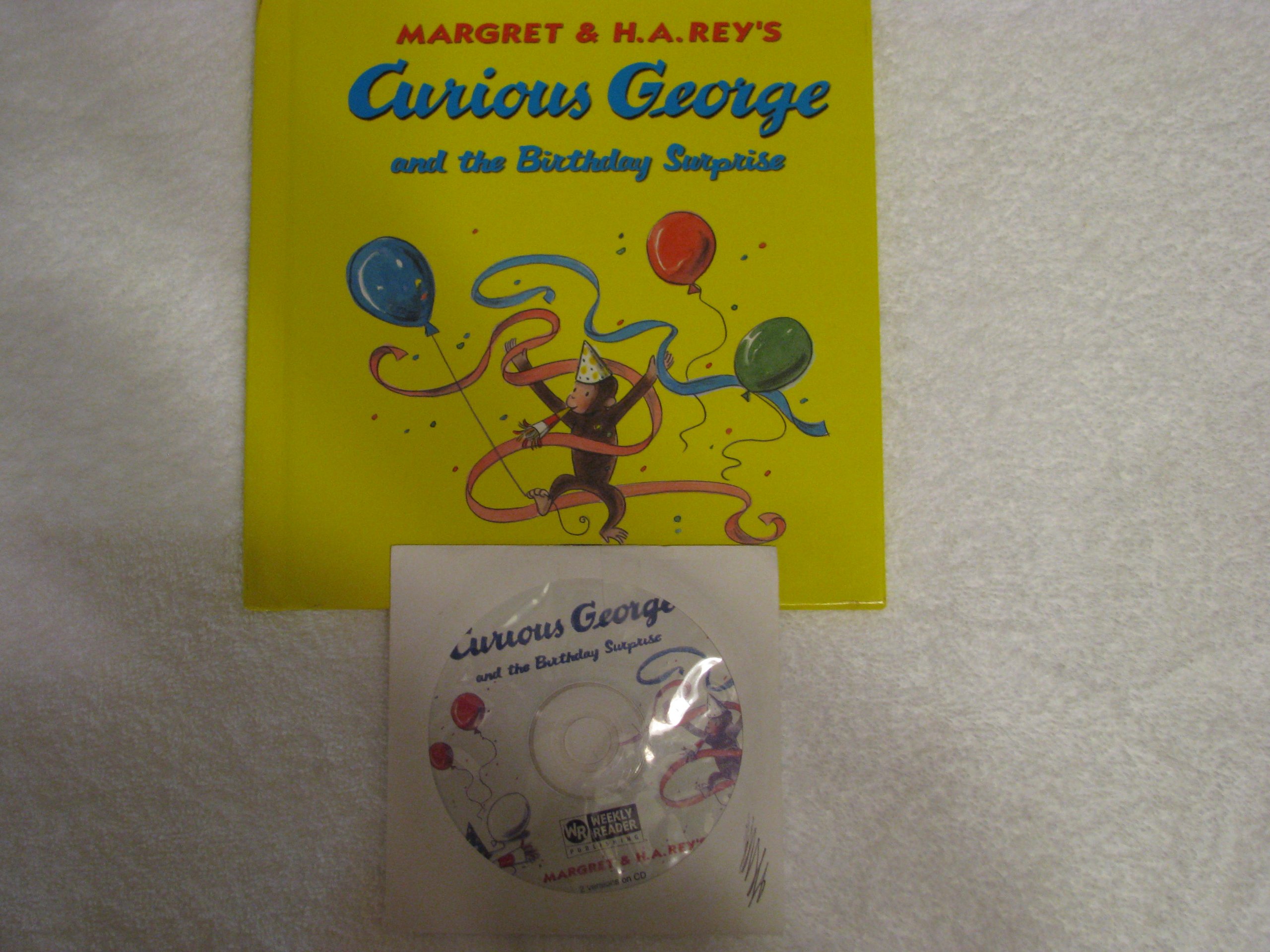Amazon.com: Curious George and the Birthday Surprise: 9780618346882 ...