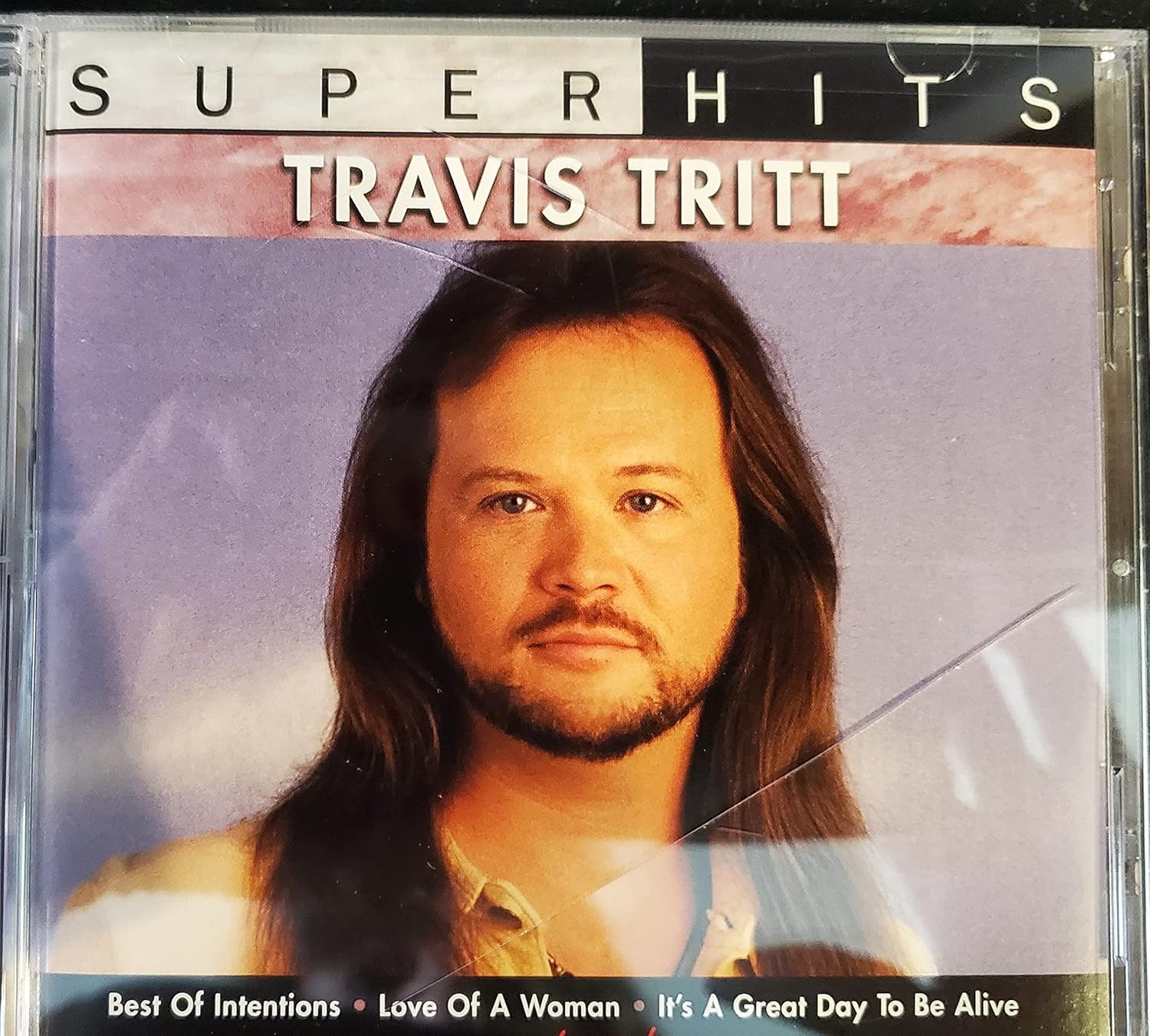 Super Hits: Travis Tritt: Travis Tritt: Amazon.in: Music}