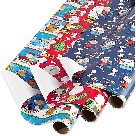 Amazon.com: Hallmark Christmas Peanuts Wrapping Paper with Cut Lines on ...