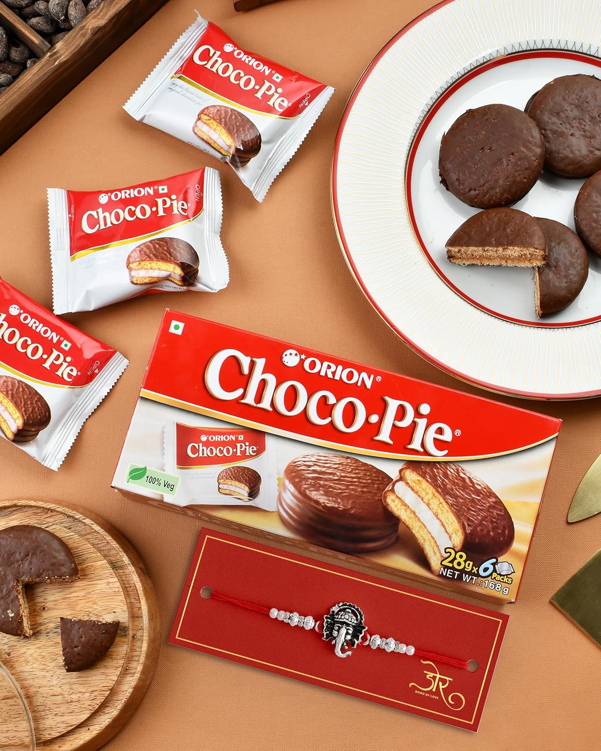 Rakhi with chocolates gift pack Orion Choco Pie 168 Grams rakhi and ...