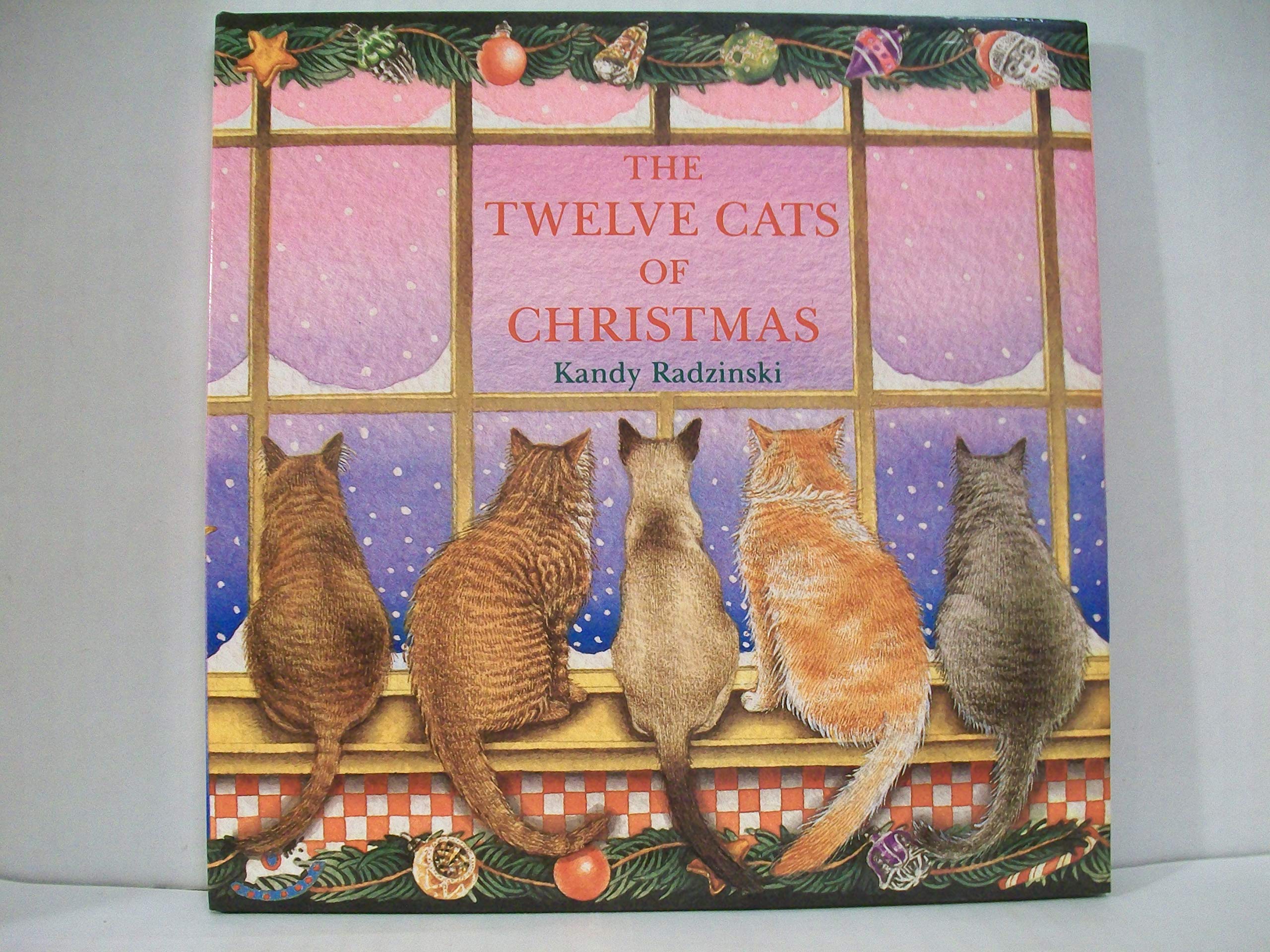 The Twelve Cats of Christmas: Radzinski, Kandy: 9780811801027: Amazon ...