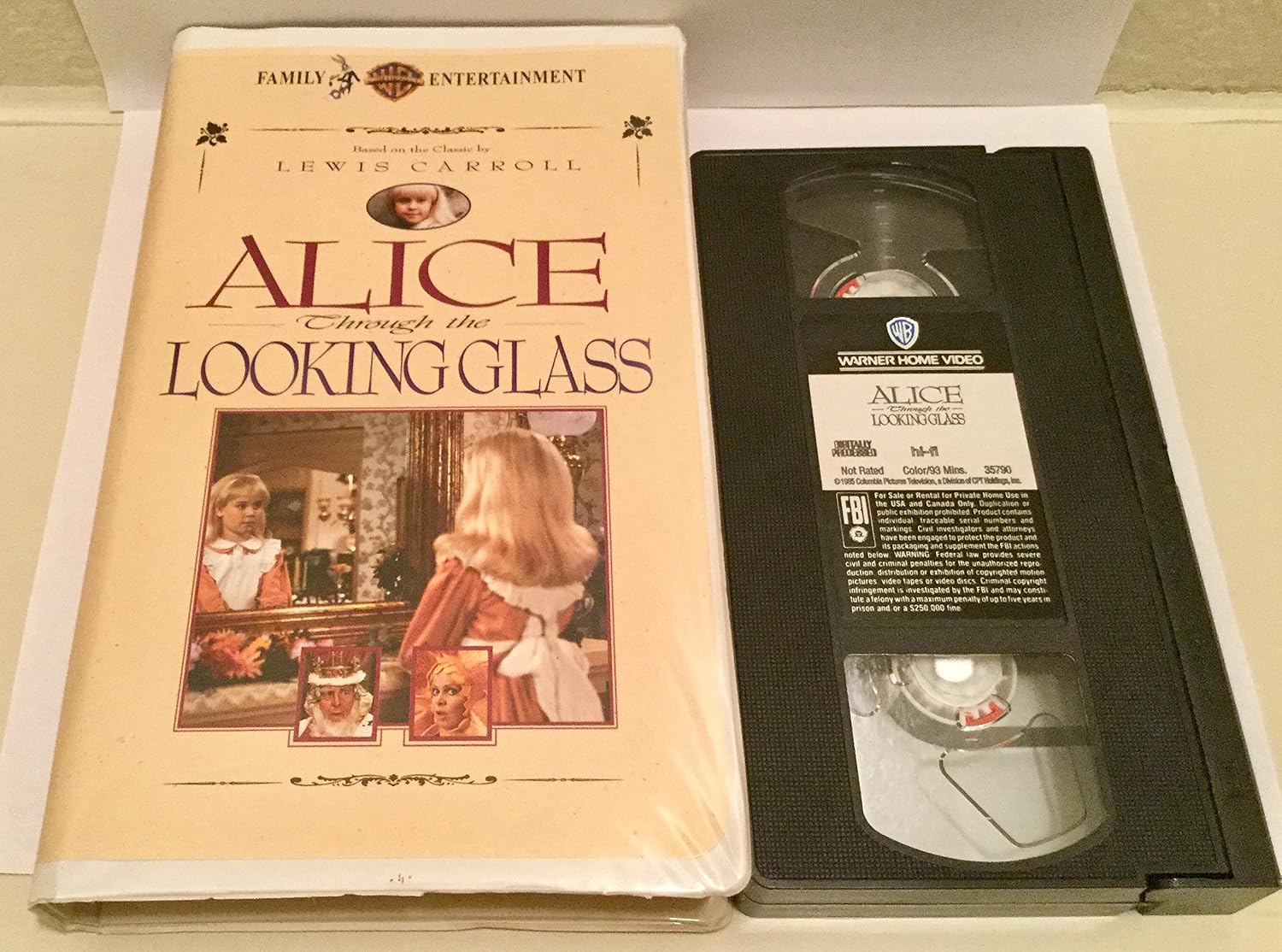 Amazon.com: Alice Through The Looking Glass [VHS] : Gregory, Newley ...