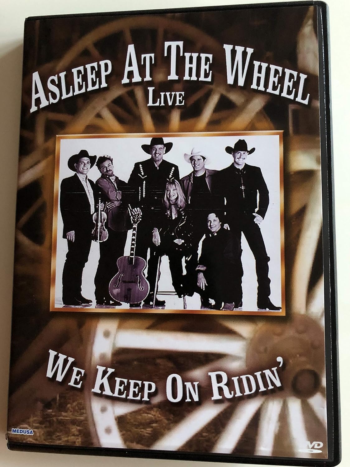 We Keep on Ridin' [Vinyl LP]: Amazon.co.uk: Asleep at the Wheel: CDs ...