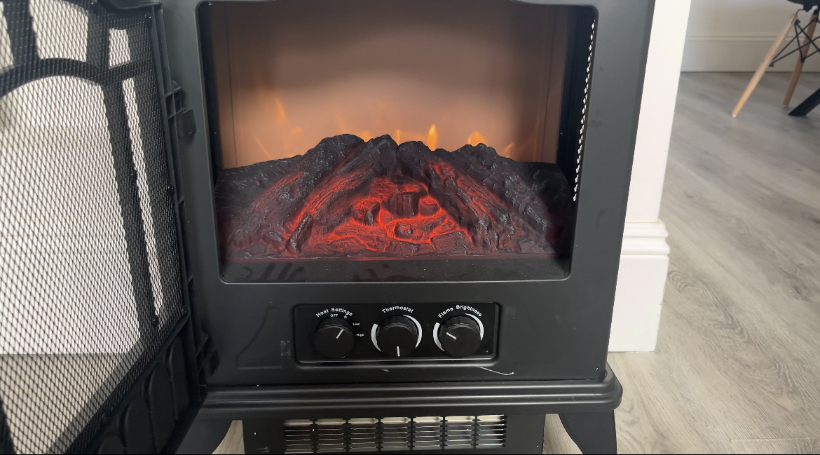 Watch Black 1500w Electric Stove Heater with Life-Like Flame on Amazon Live