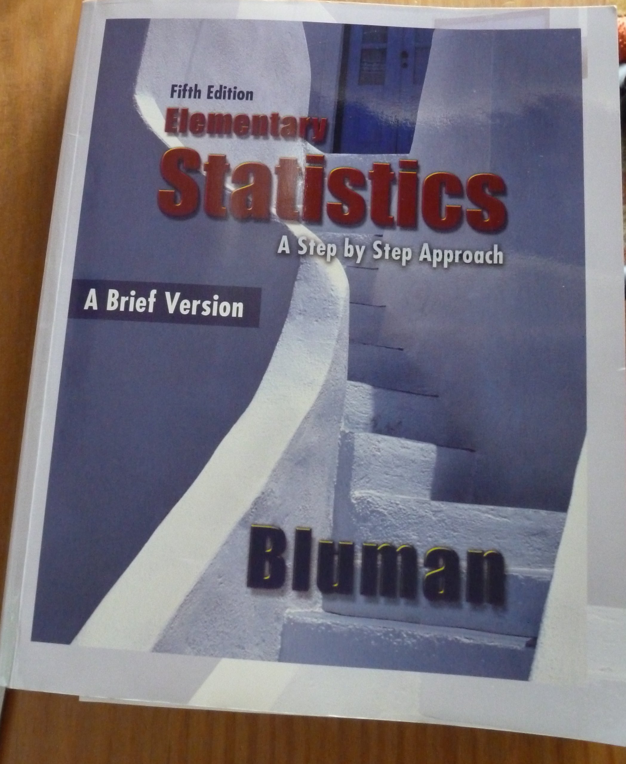 Amazon.com: Elementary Statistics: A Step by Step Approach ...