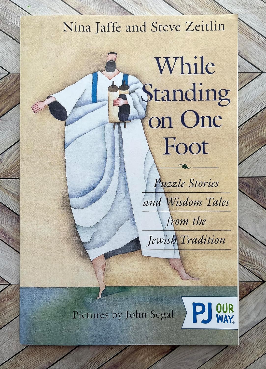 While Standing on One Foot: Puzzle Stories and Wisdom Tales from the ...