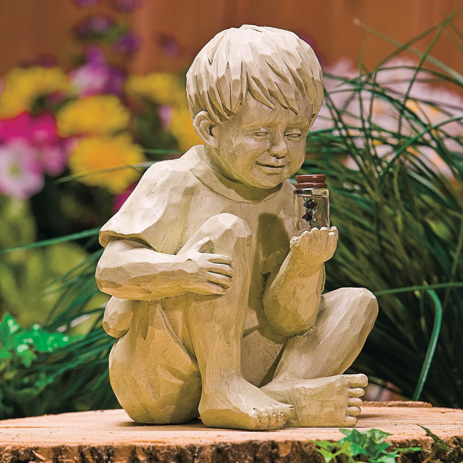 Amazon.com: Ceramic Boy with Solar Lighted Fireflies - Decorative ...