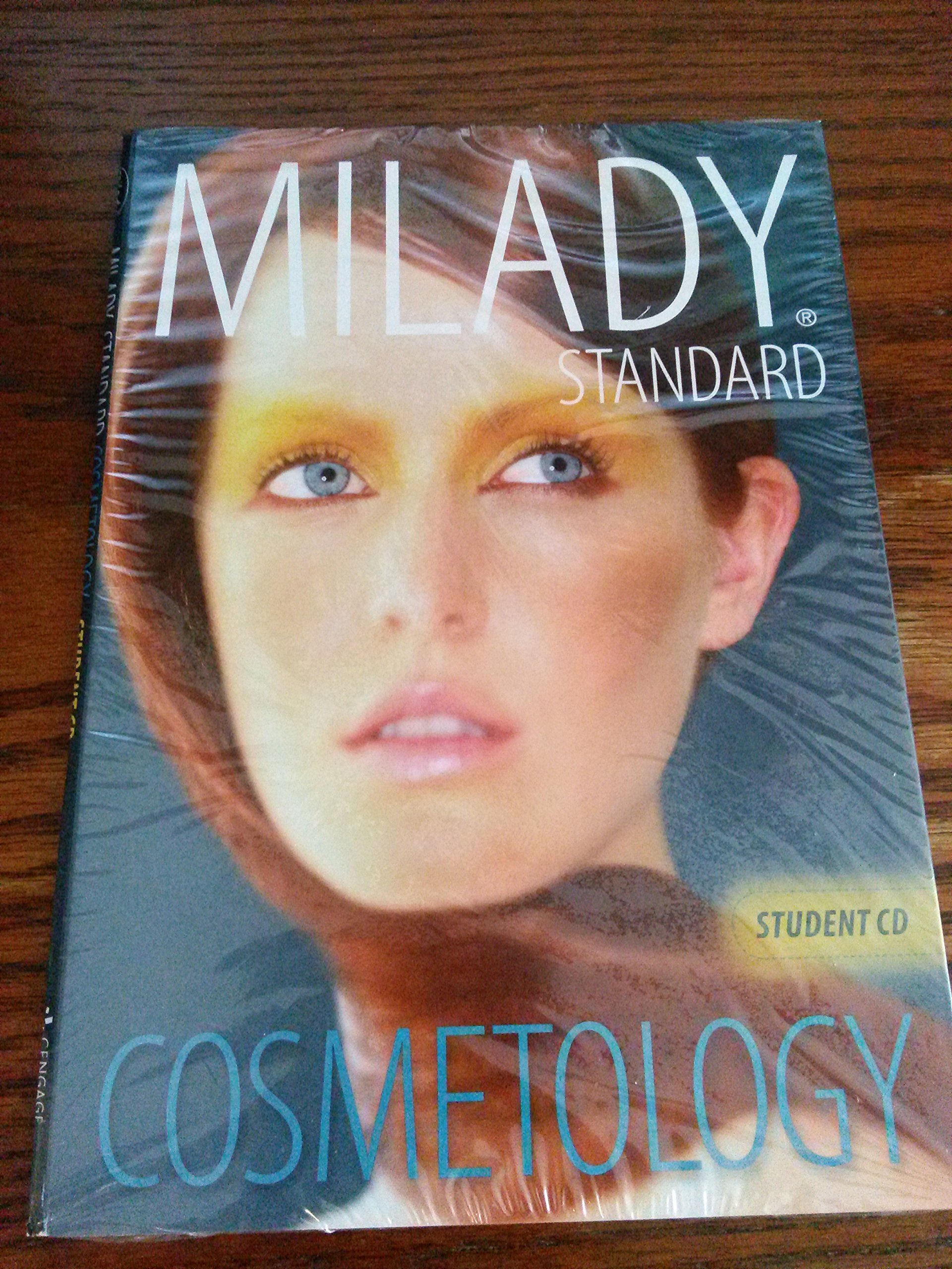 Milady's Standard Cosmetology: Milady: 9781439059197: Amazon.com: Books