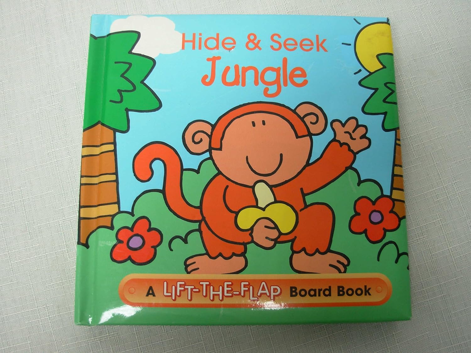 Hide & Seek Jungle: A Lift-The-Flap Board Book : Amazon.co.uk: Books