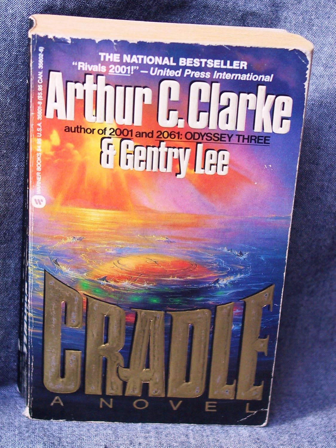 Cradle: Clarke, Arthur C., Lee, Gentry: 9780446356015: Amazon.com: Books