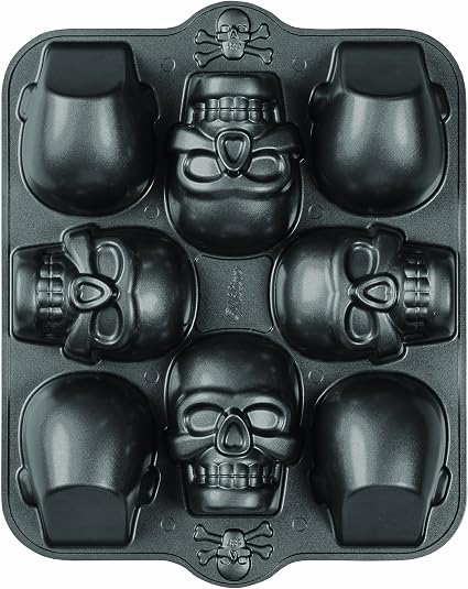 Amazon.com: Wilton 2105-0607 Dimensions 8-Cavity 3D Skull Pan, Mini ...