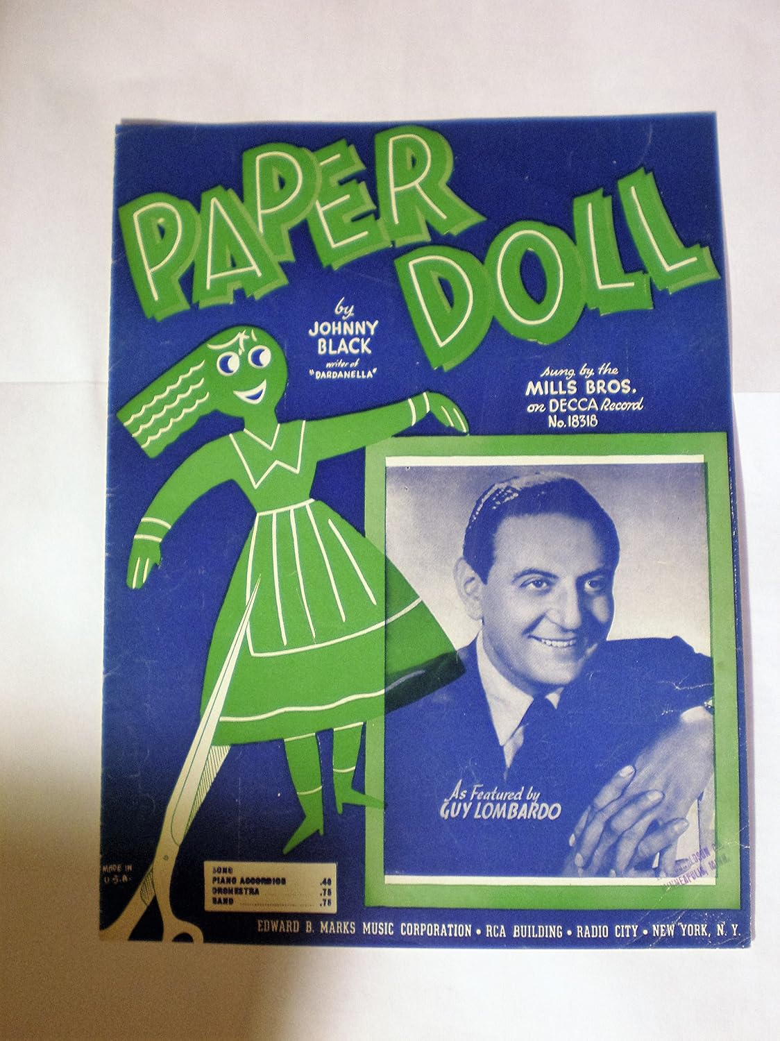 Paper Doll as recorded by The Mills Brothers: Amazon.com: Books